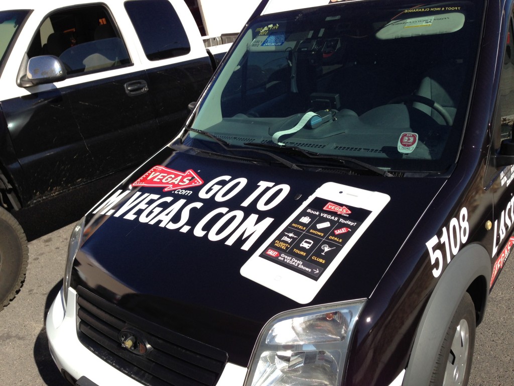Vegas.com Black Taxi Wrap 4 - Patrick's Signs, Inc.