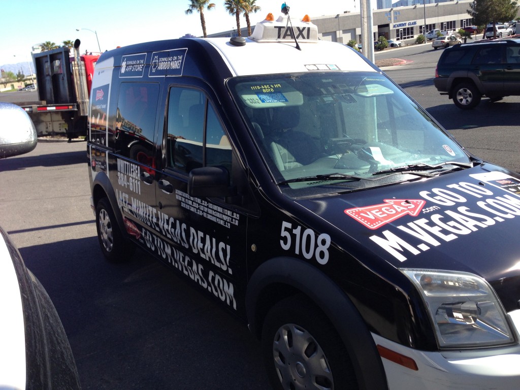 Vegas.com Black Taxi Wrap 3 - Patrick's Signs, Inc.